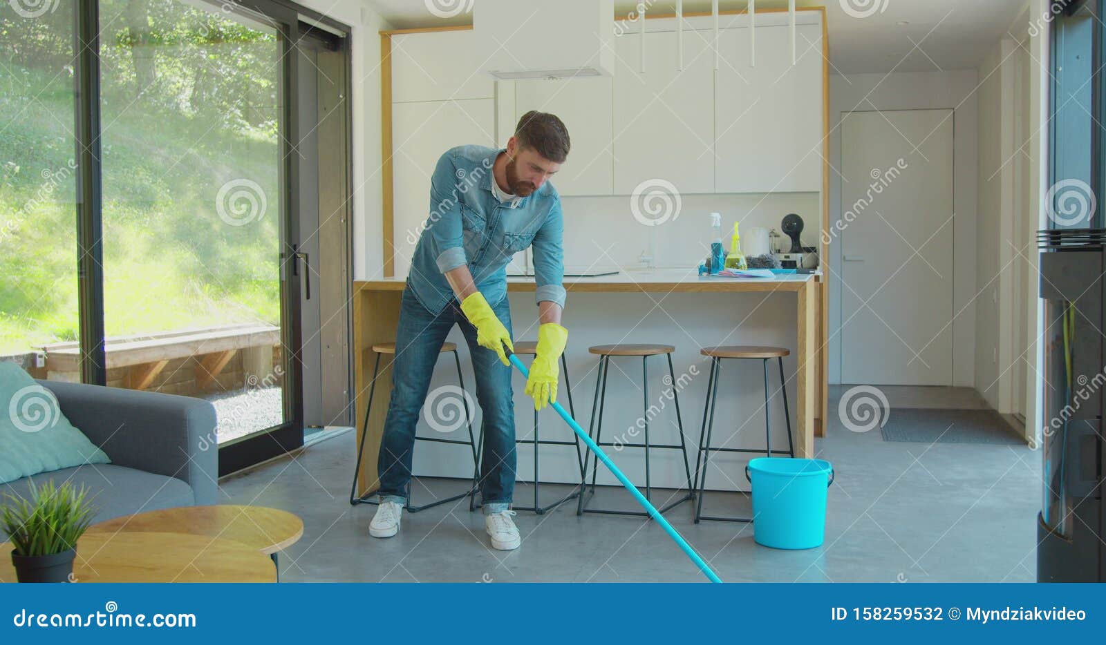 Man is Mopping Floor at Home and Having Fun. Man, Joy and Houses ...