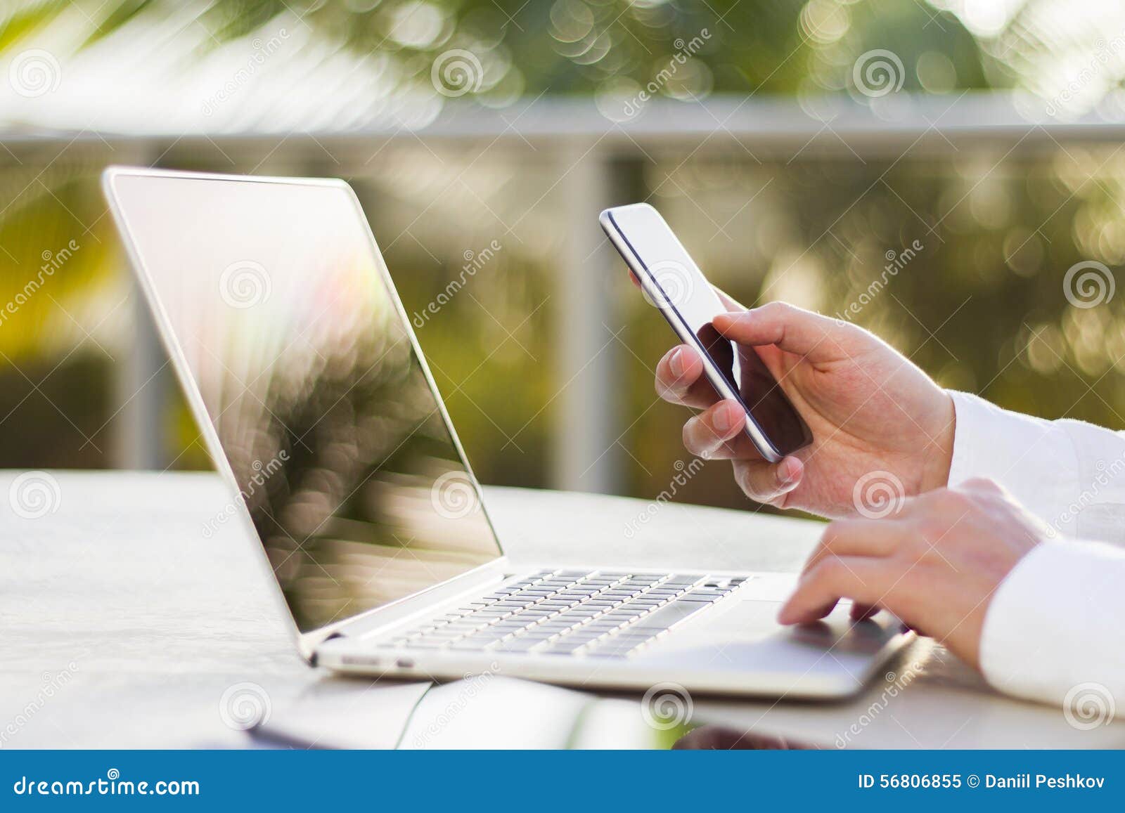 Man in the Morning with a Cell Phone and Laptop Stock Image - Image of ...