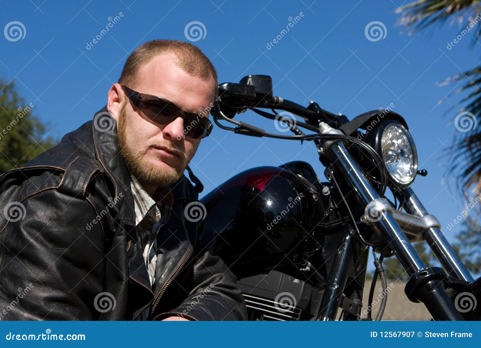 Man with Motorcycle stock image. Image of black, leather - 12567907