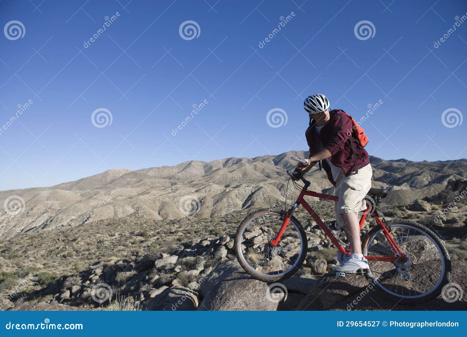 Man Mountain Bike Arid Landscape Stock Photos - Free & Royalty-Free ...