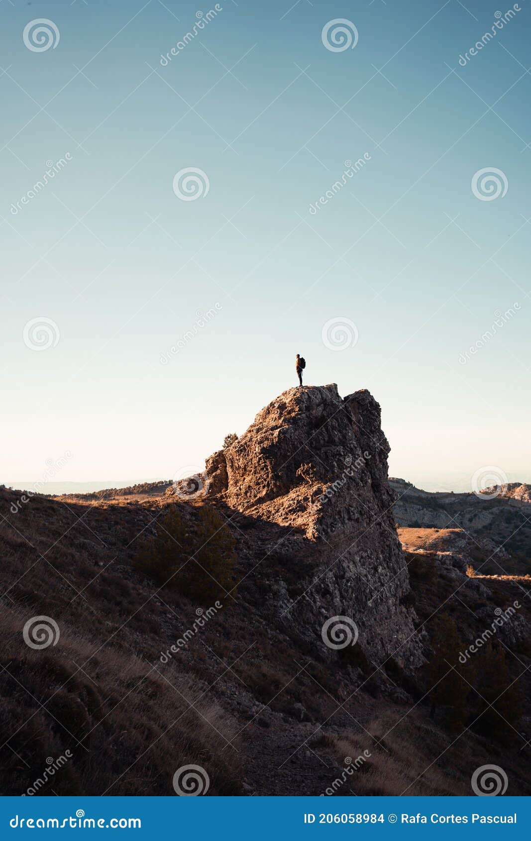 Man in the Mountain at Sunset. Guy Practicing Trekking Stock Photo ...