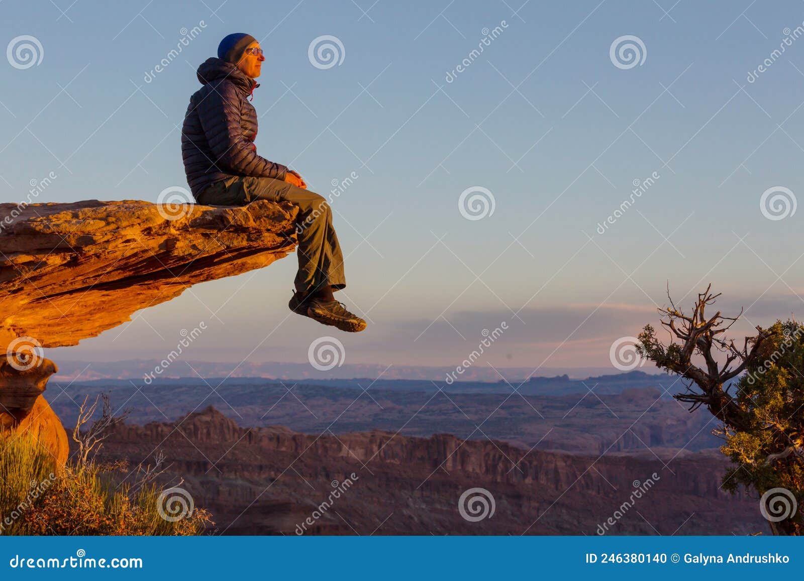 Man on the cliff stock photo. Image of inspiration, hike - 246380140