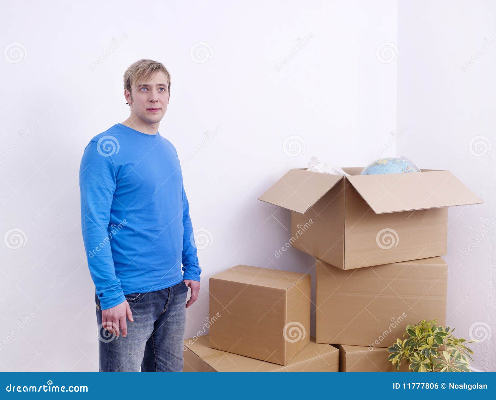 Man with moving boxes stock photo. Image of moved, unpacks - 11777806