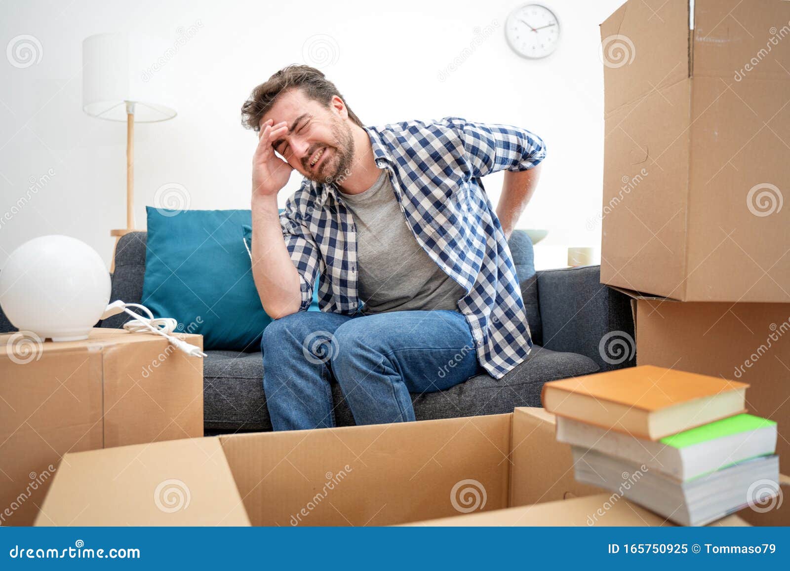 Man Moving Boxes and Feeling Back Pain because Heavy Weight Stock Image ...