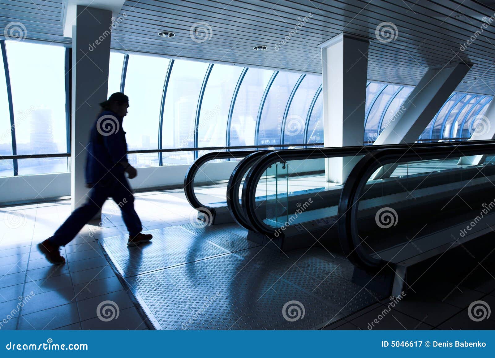 Man moving in corridor stock image. Image of human, hall - 5046617