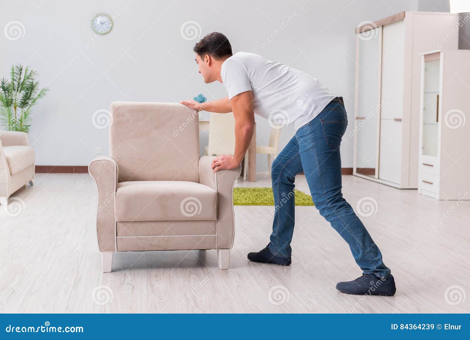 The Man Moving Furniture at Home Stock Image - Image of muscular ...