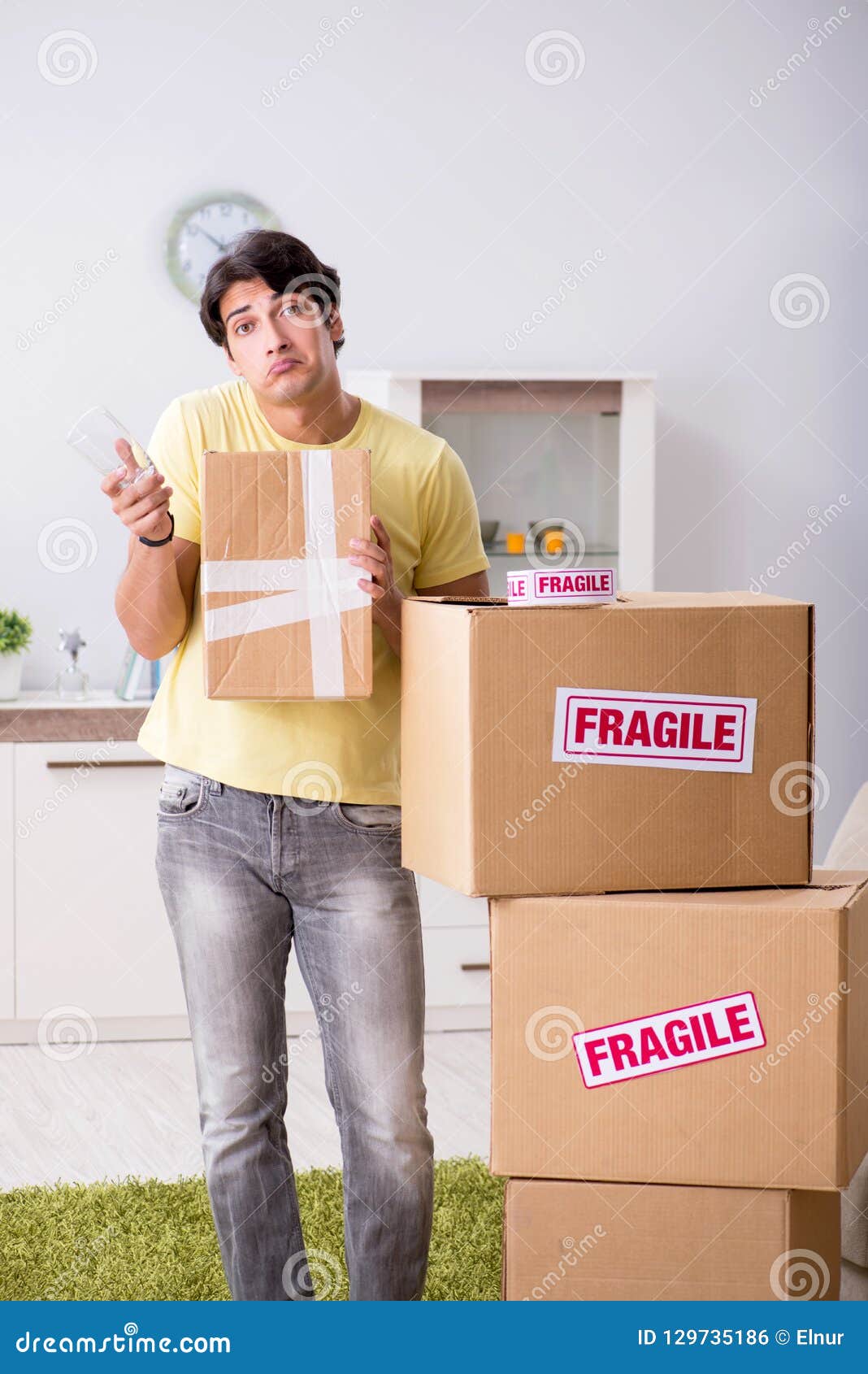 The Man Moving House and Relocating with Fragile Items Stock Photo ...