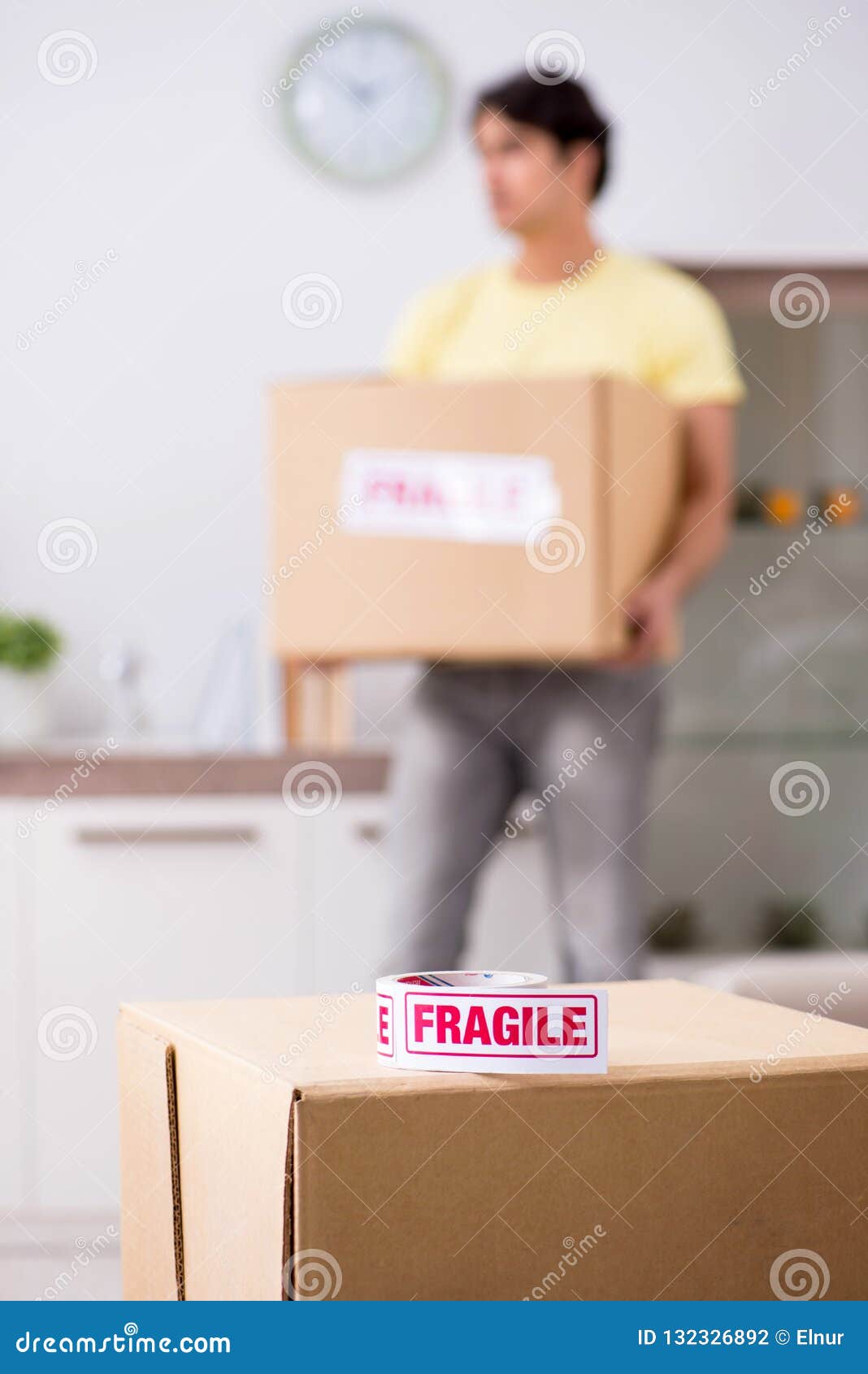 The Man Moving House and Relocating with Fragile Items Stock Photo ...