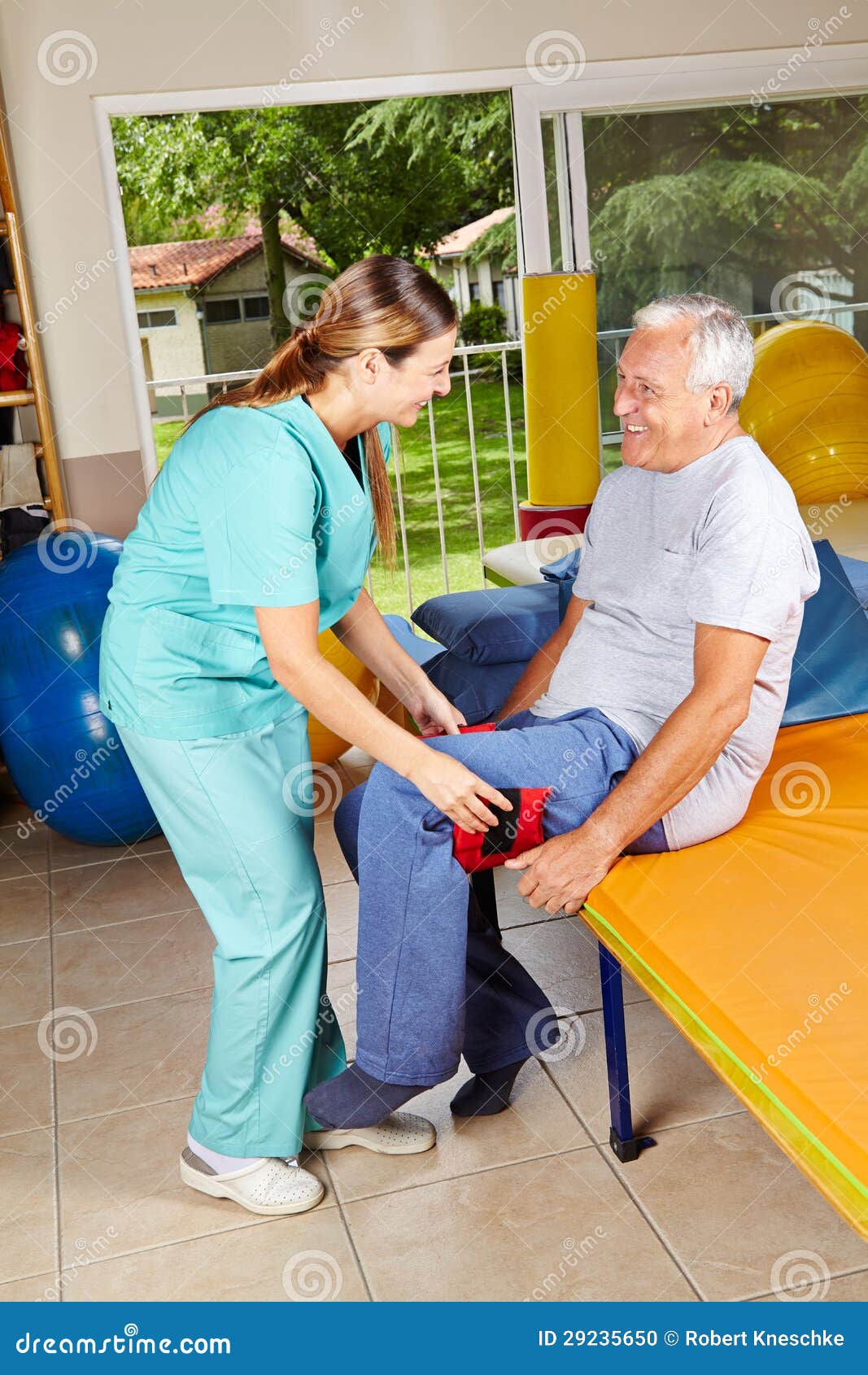 Man Moving Legs at Physiotherapy Stock Photo - Image of elderly ...