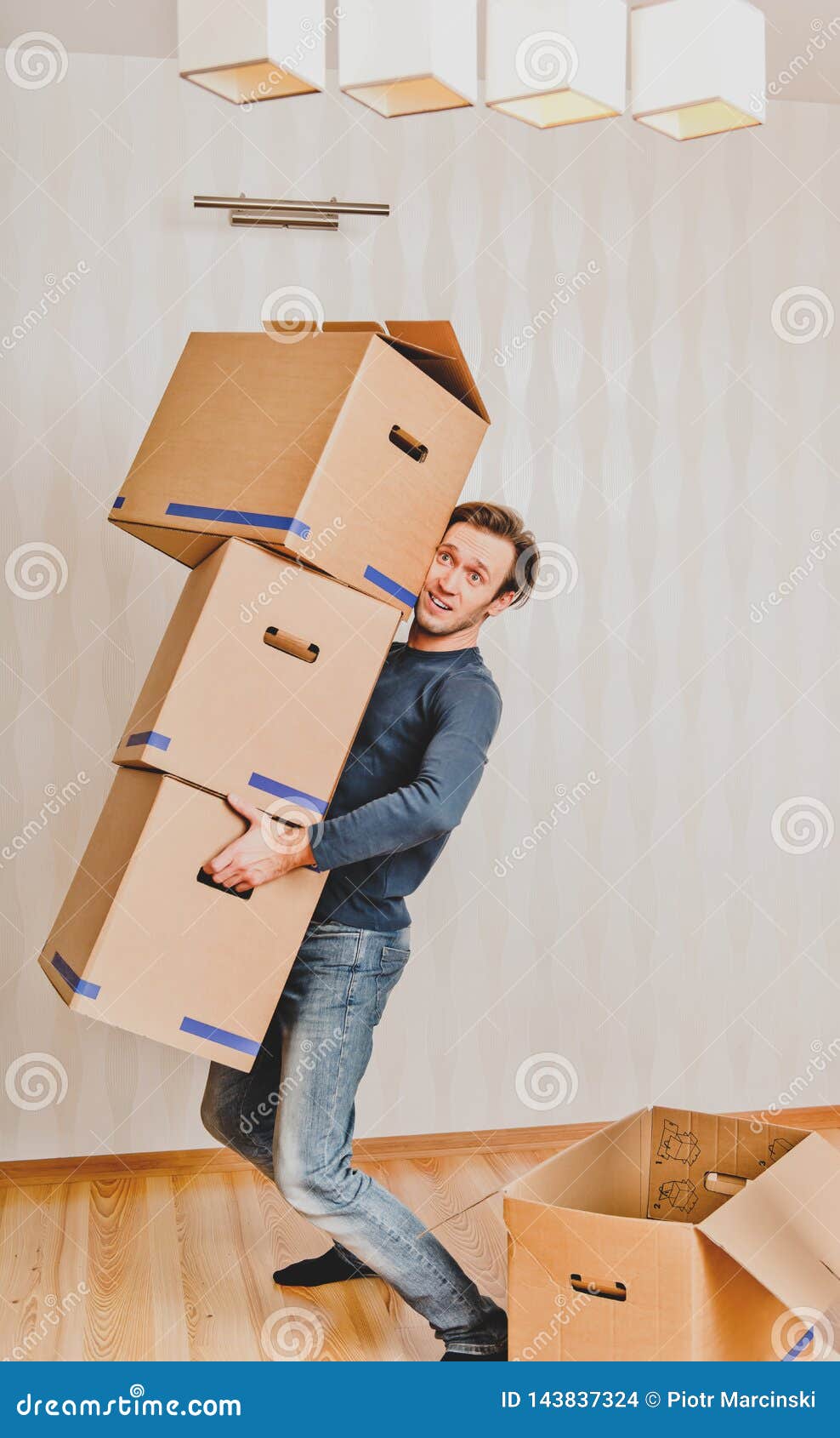 Man Moving in New Apartmant Stock Photo - Image of adult, casual: 143837324