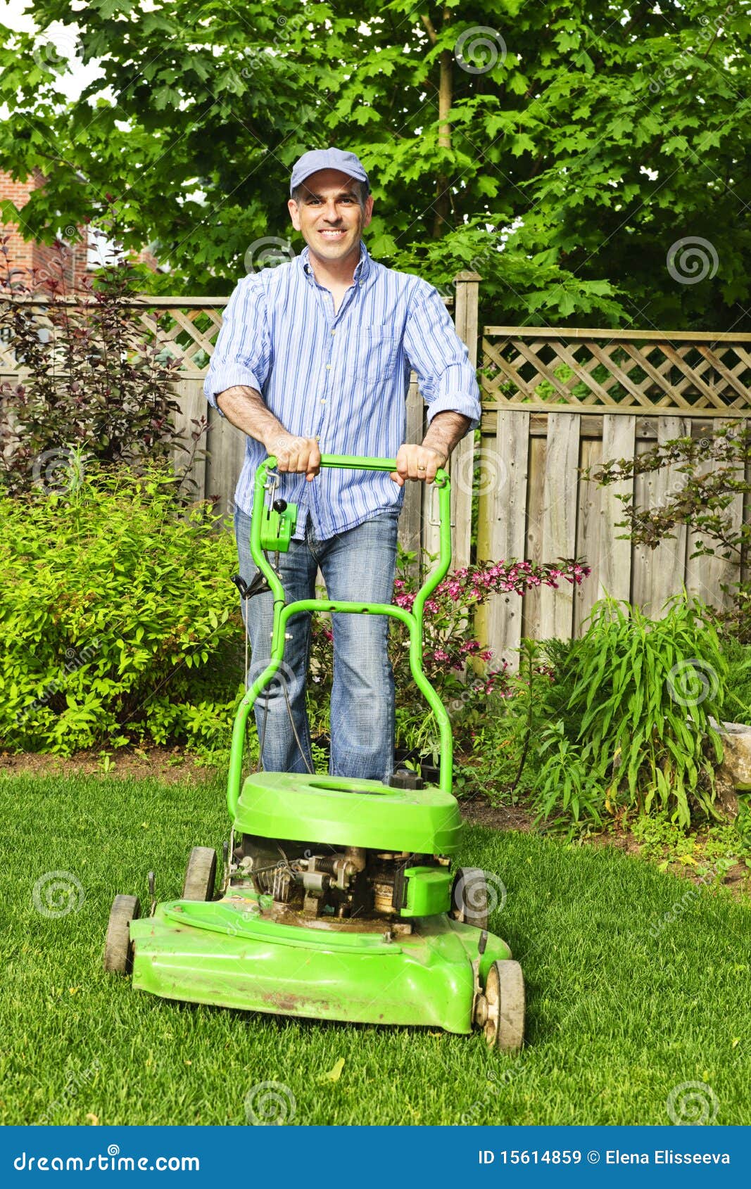 Man mowing lawn stock image. Image of caring, maintaining - 15614859