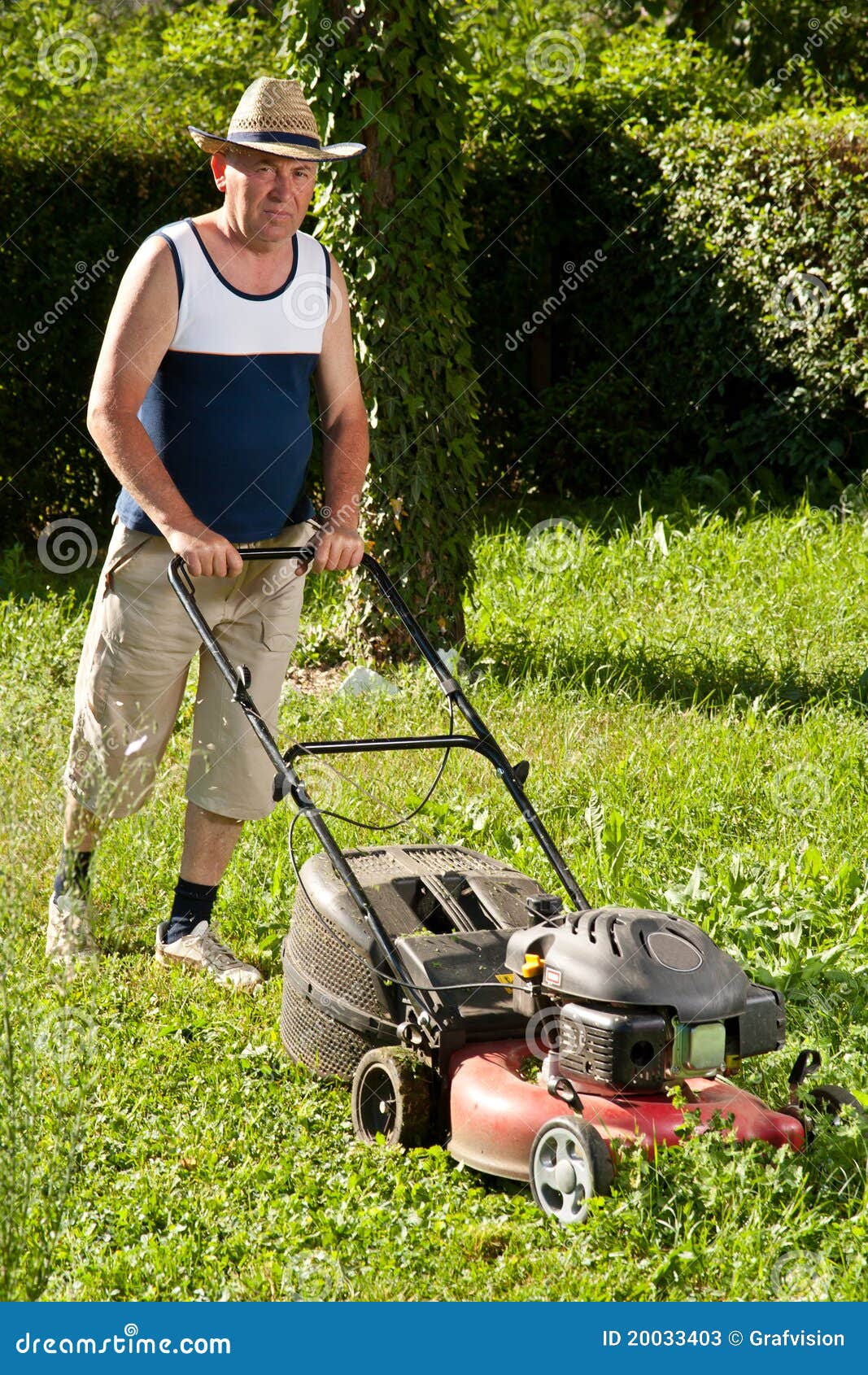 Man mowing the lawn stock image. Image of lawnmower, field - 20033403