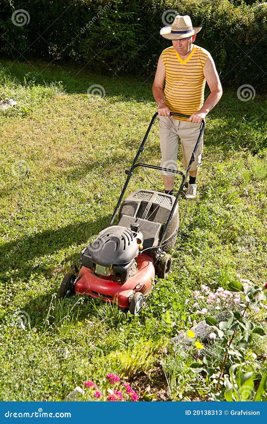 Man Mowing The Lawn Stock Photos - Image: 20138313