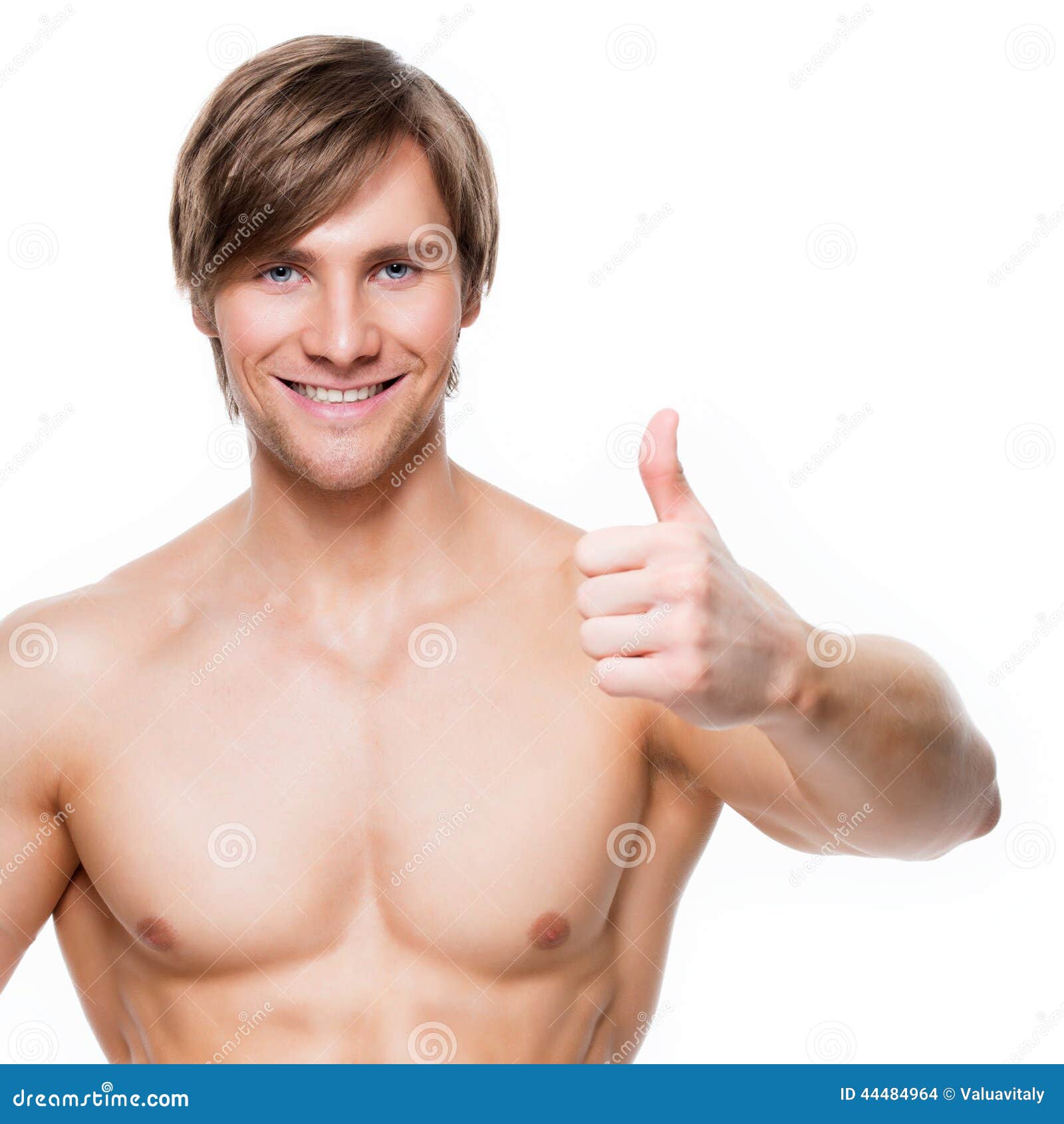 Man with Muscular Torso Shows Thumbs Up Sign. Stock Photo - Image of ... Man with Muscular Torso Shows Thumbs Up Sign. Stock Photo - Image of ...