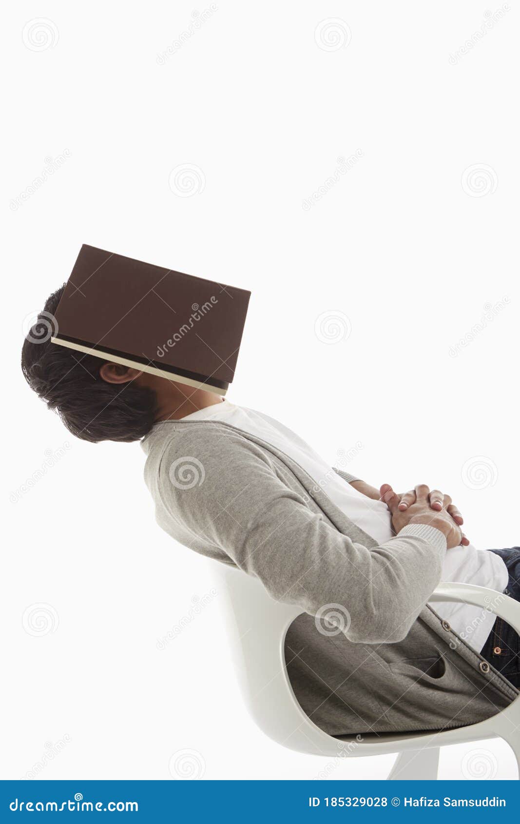 Man Napping on a Chair with Face Covered Stock Photo - Image of ...