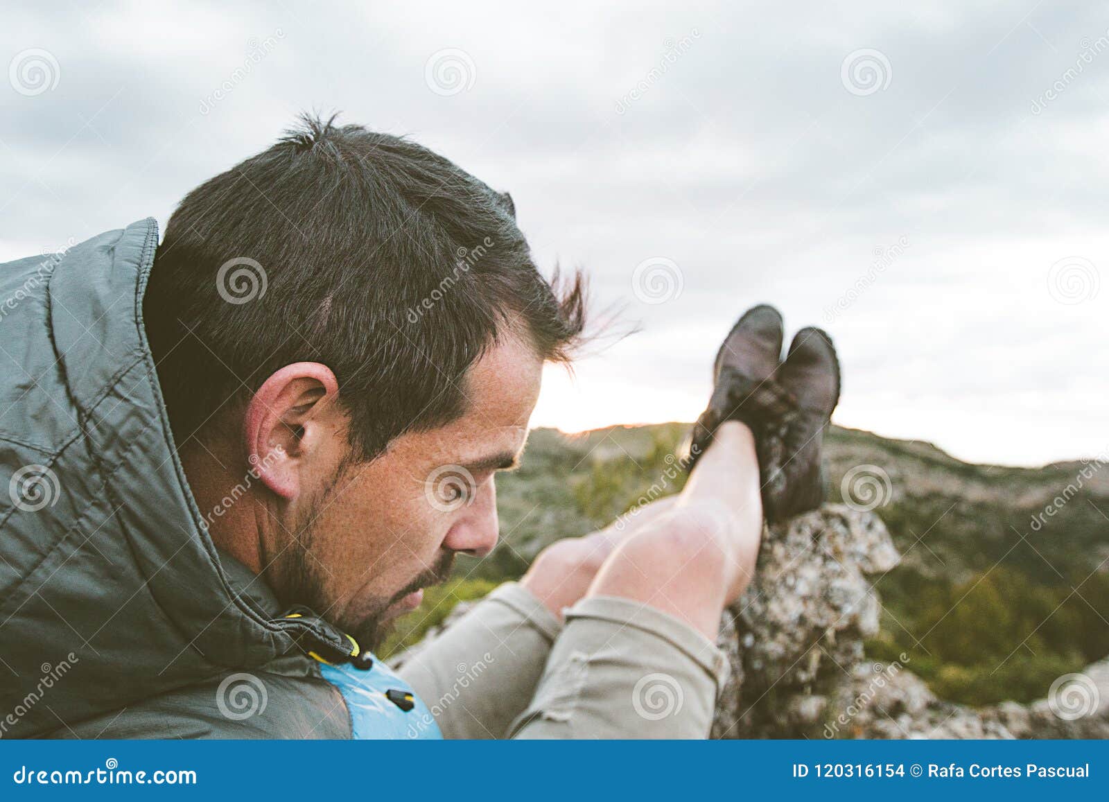 Man in Nature Relaxed and Seated. Guy Observing the Landscape in the ...