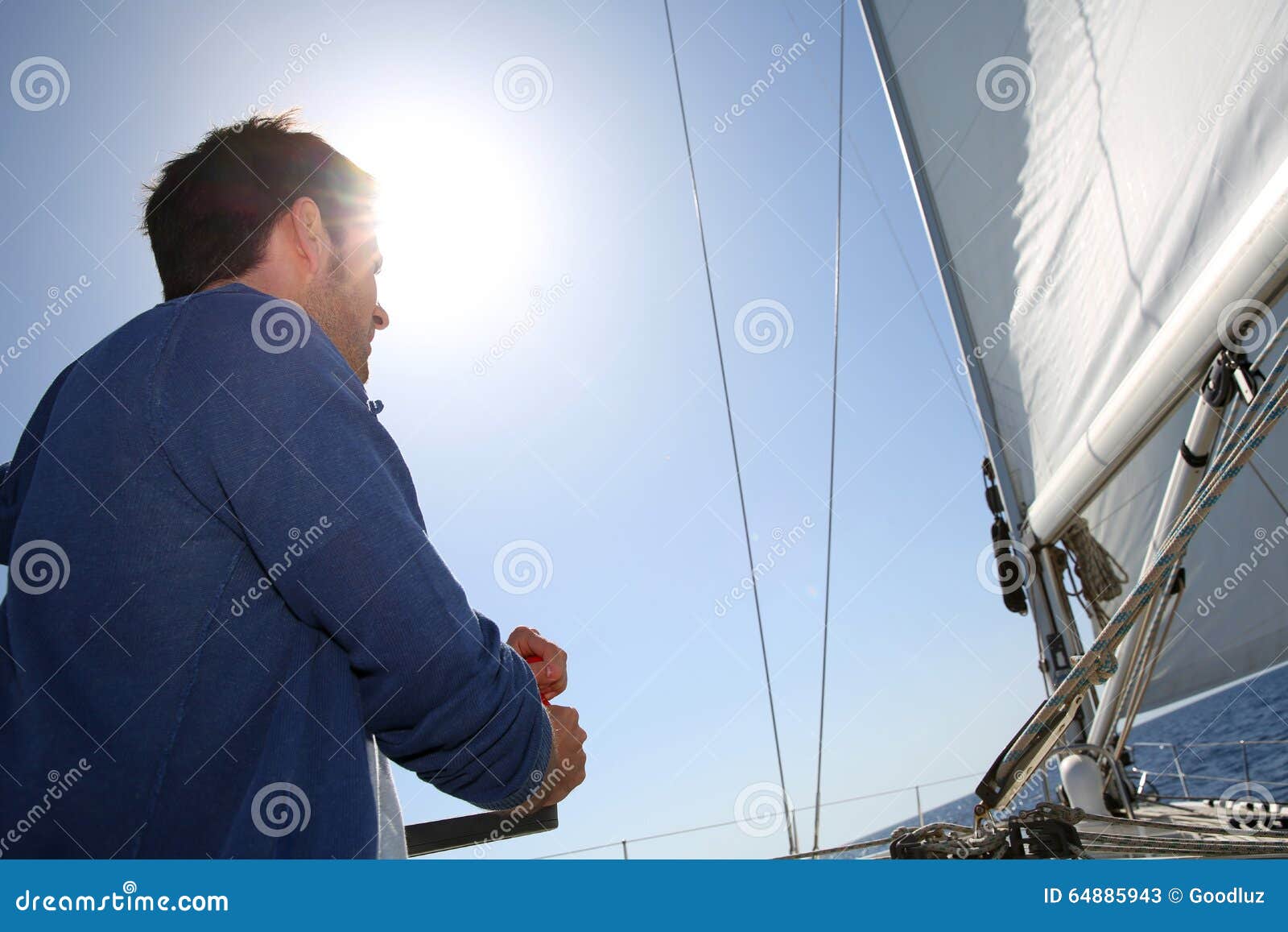 Man Navigating Boat with Sails Stock Image - Image of single, cruising ...