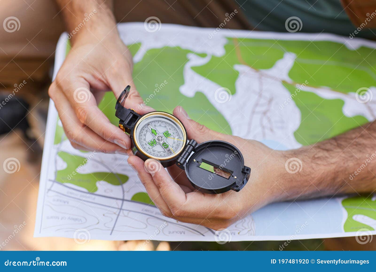 Man Navigating with Compass and Map Stock Photo - Image of male ...