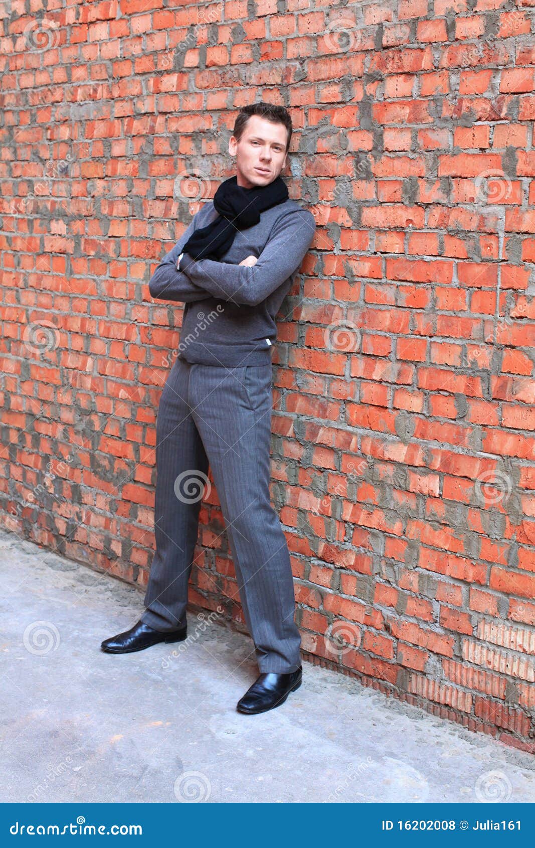 Man near brick wall stock photo. Image of brick, emotions - 16202008