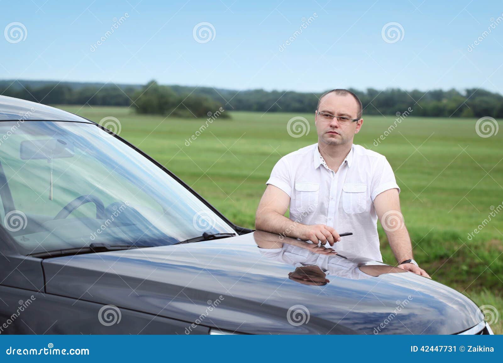 Man Near the Car on the Road Stock Image - Image of male, outside: 42447731