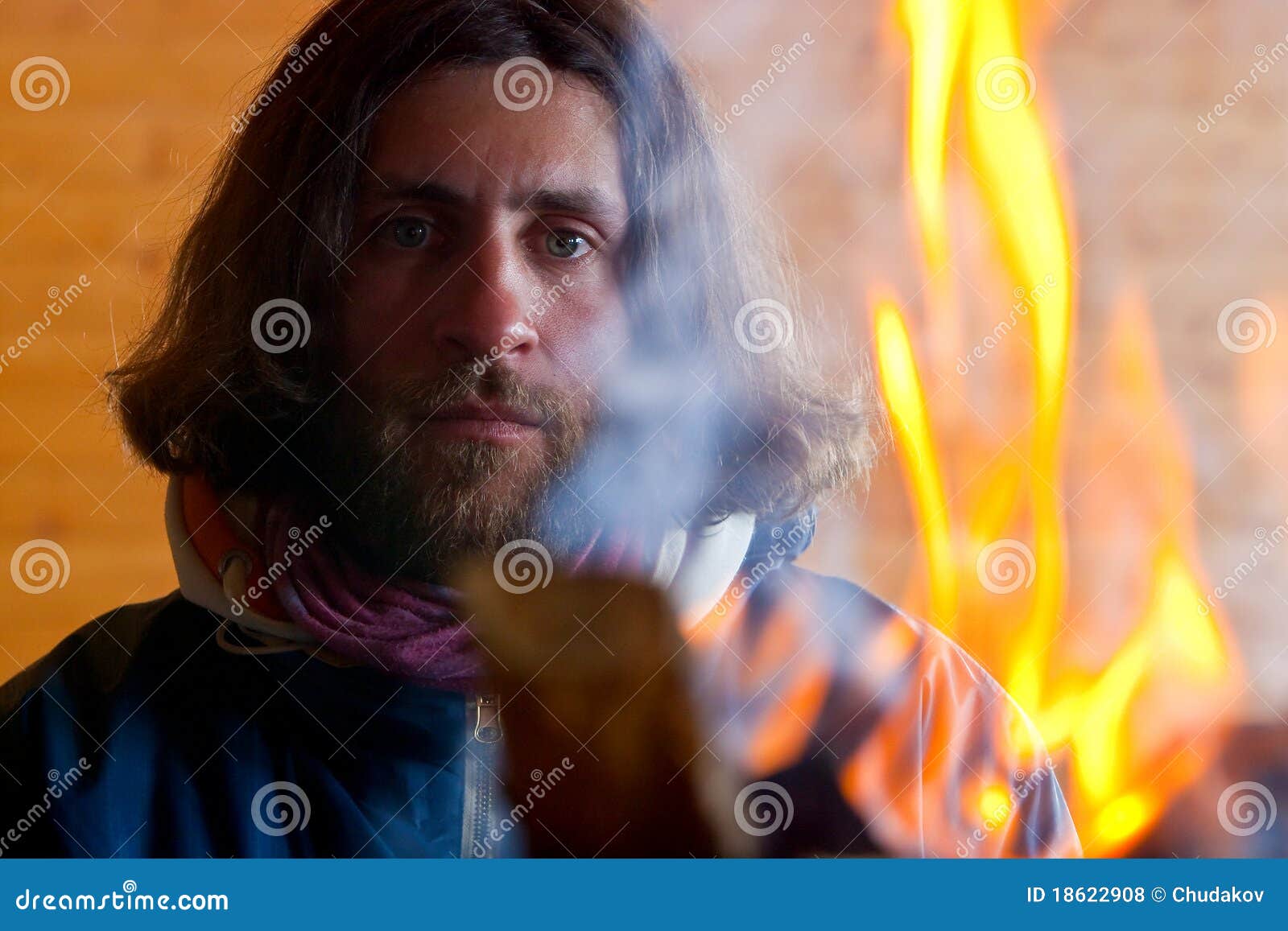 A man near a fire stock photo. Image of male, face, comfort - 18622908
