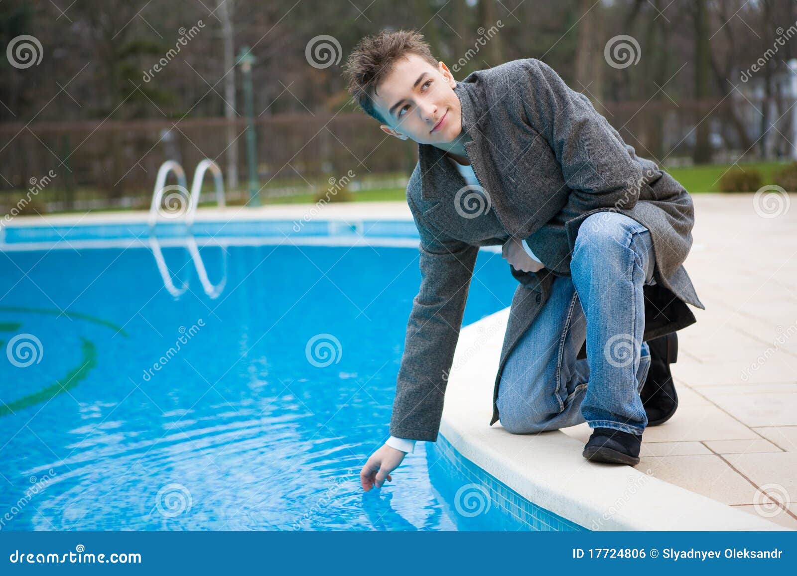 Man near the swimming pool stock photo. Image of model - 17724806