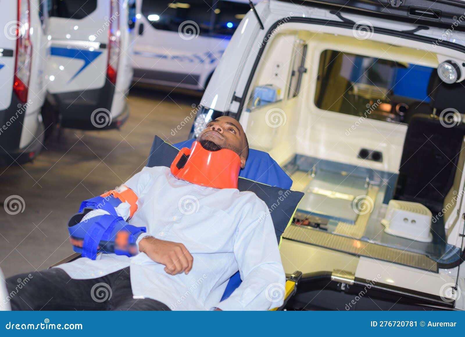 Man in Neck Brace beside Ambulance Stock Image - Image of young ...
