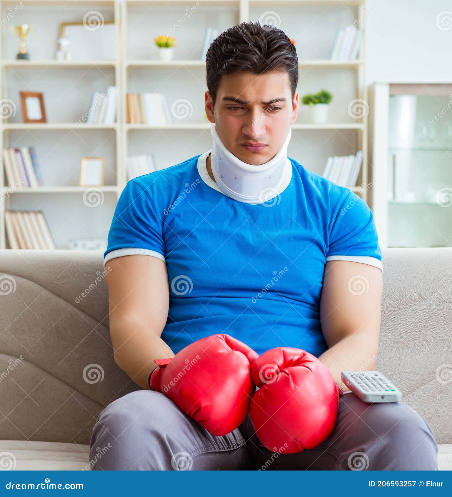 Man with Neck Injury Watching Boxing at Home Stock Image - Image of ...