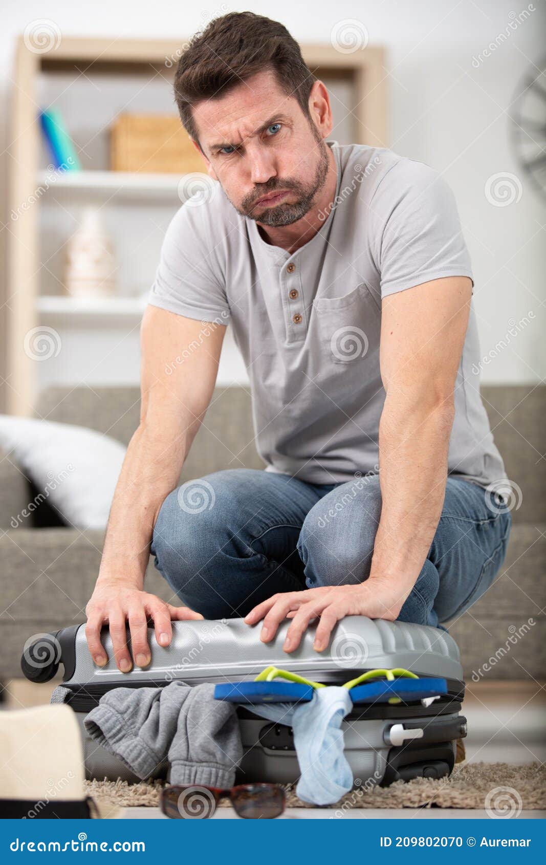 Man Needs Help To Close Suitcase Stock Photo - Image of case, luggages ...