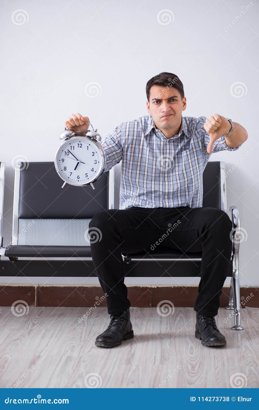 The Man Nervously Impatiently Waiting in the Lobby Stock Photo - Image ...