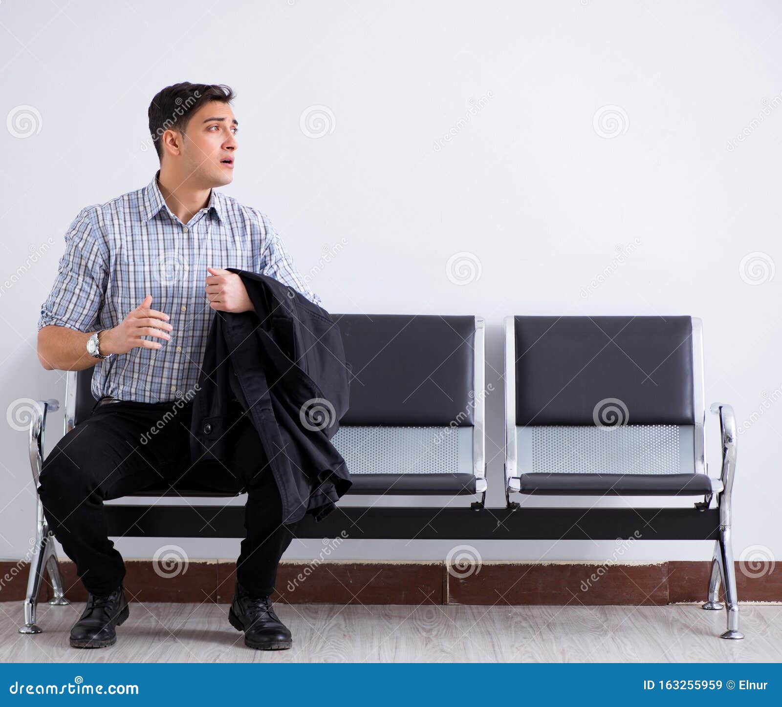 Man Nervously Impatiently Waiting in the Lobby Stock Image - Image of ...