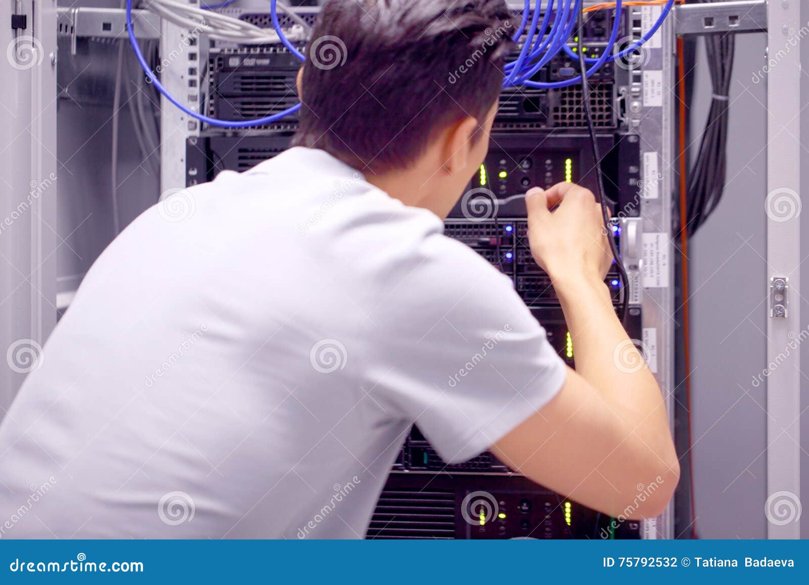 Man in network server room stock photo. Image of rack - 75792532