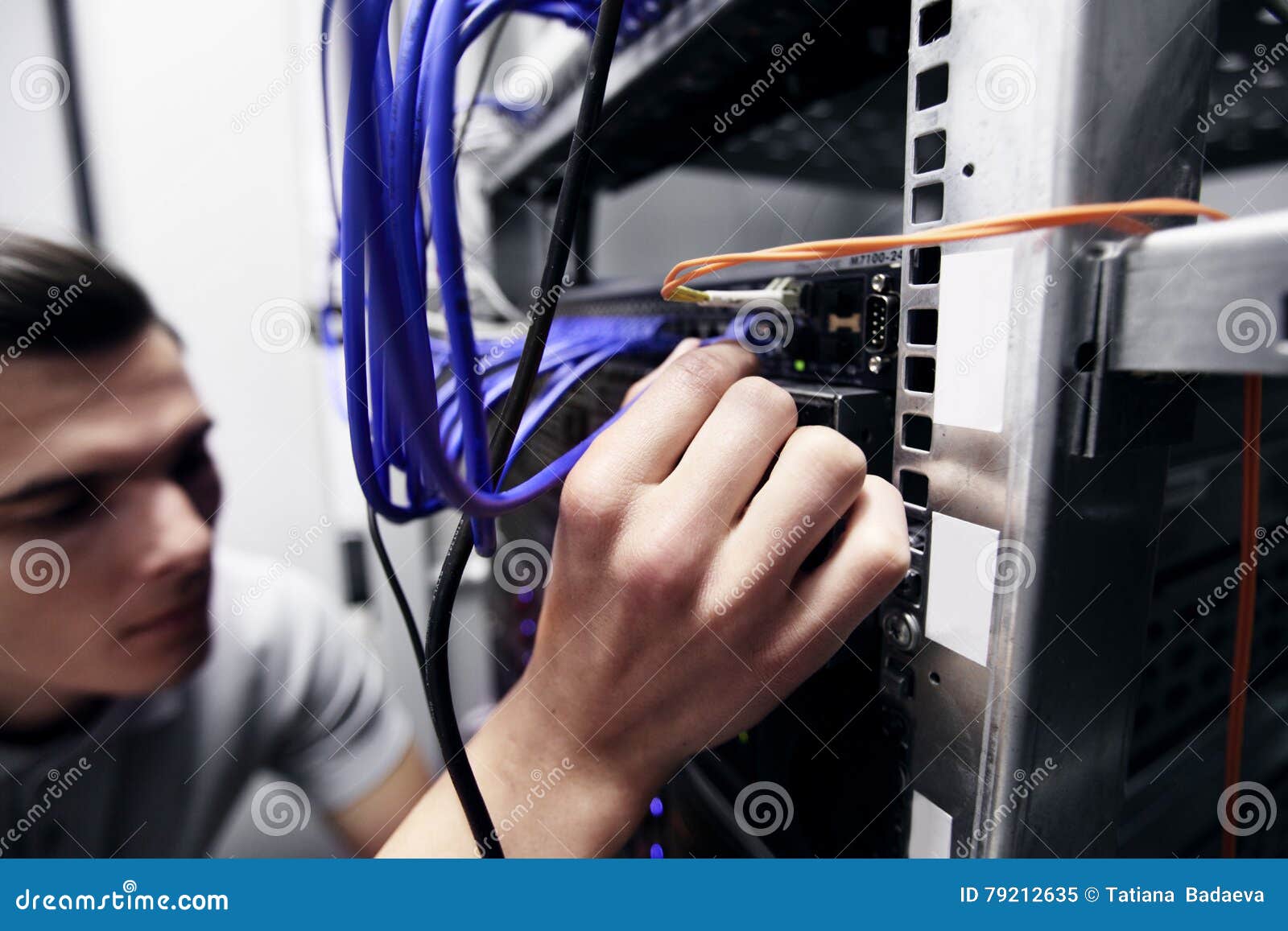 Man in network server room stock image. Image of tech - 79212635