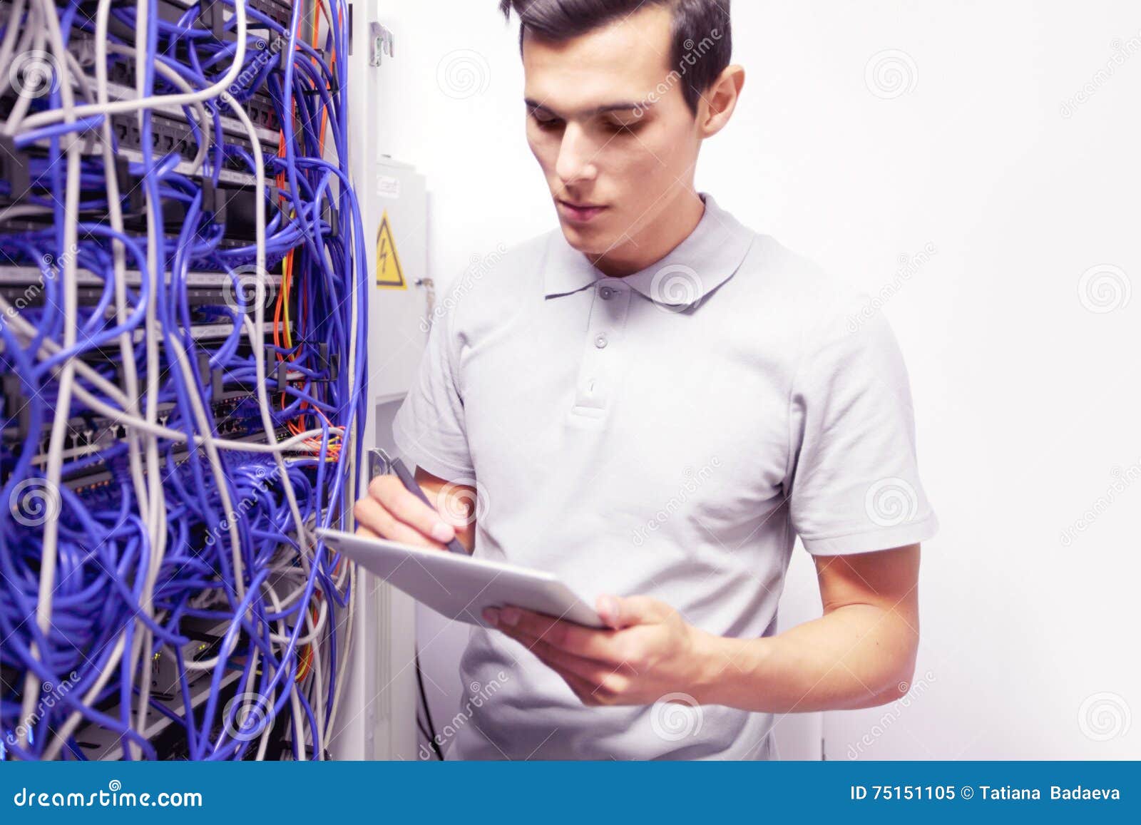 Man in network server room stock image. Image of engineer - 75151105