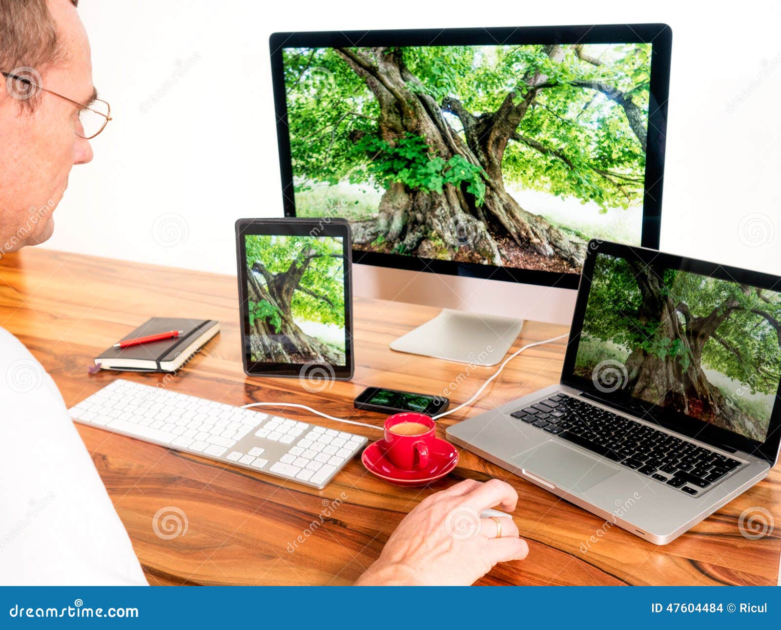 Man with Networked Computers and Mobile Devices Stock Photo - Image of ...