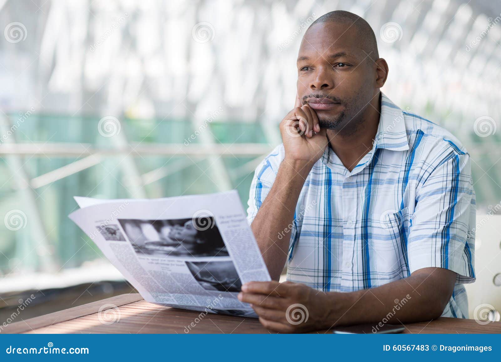 Man with newspaper stock image. Image of sitting, person - 60567483