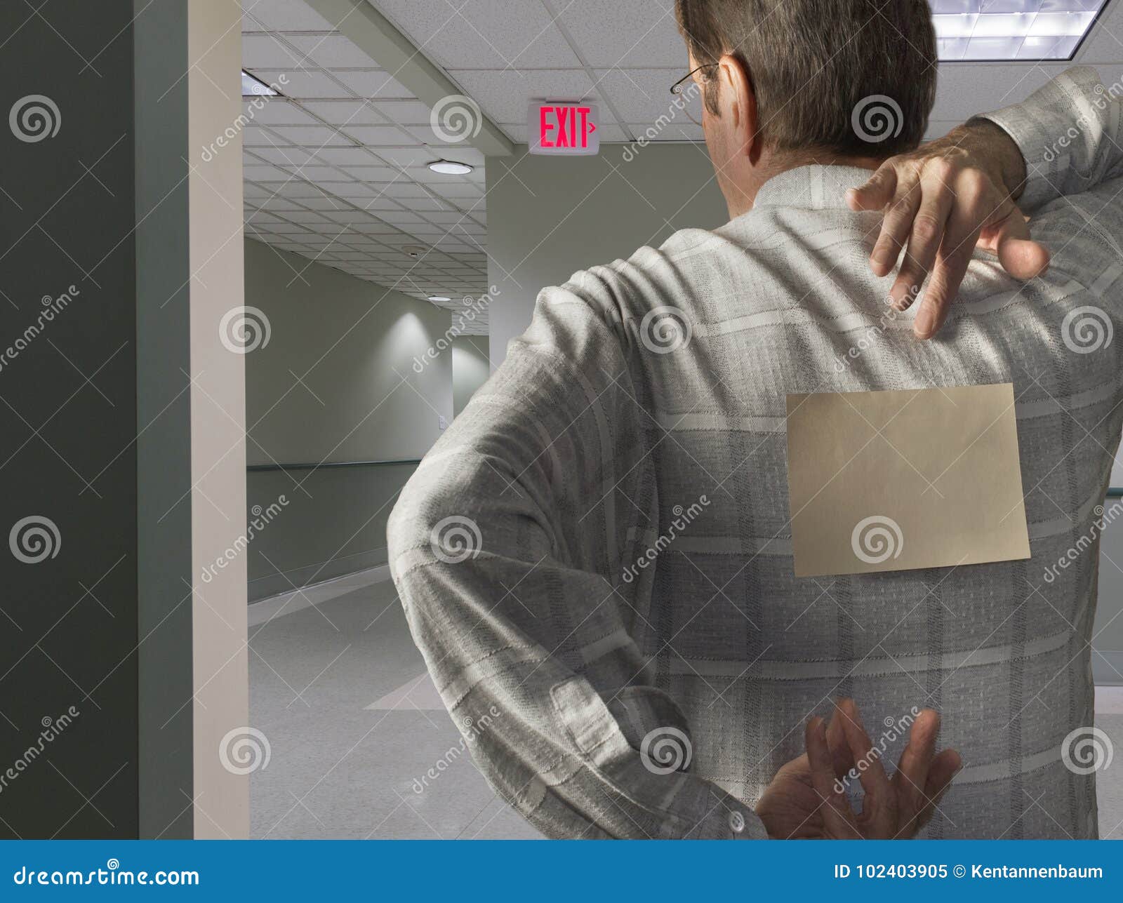 Man with Note on Back in Hallway Stock Image - Image of back, male ...