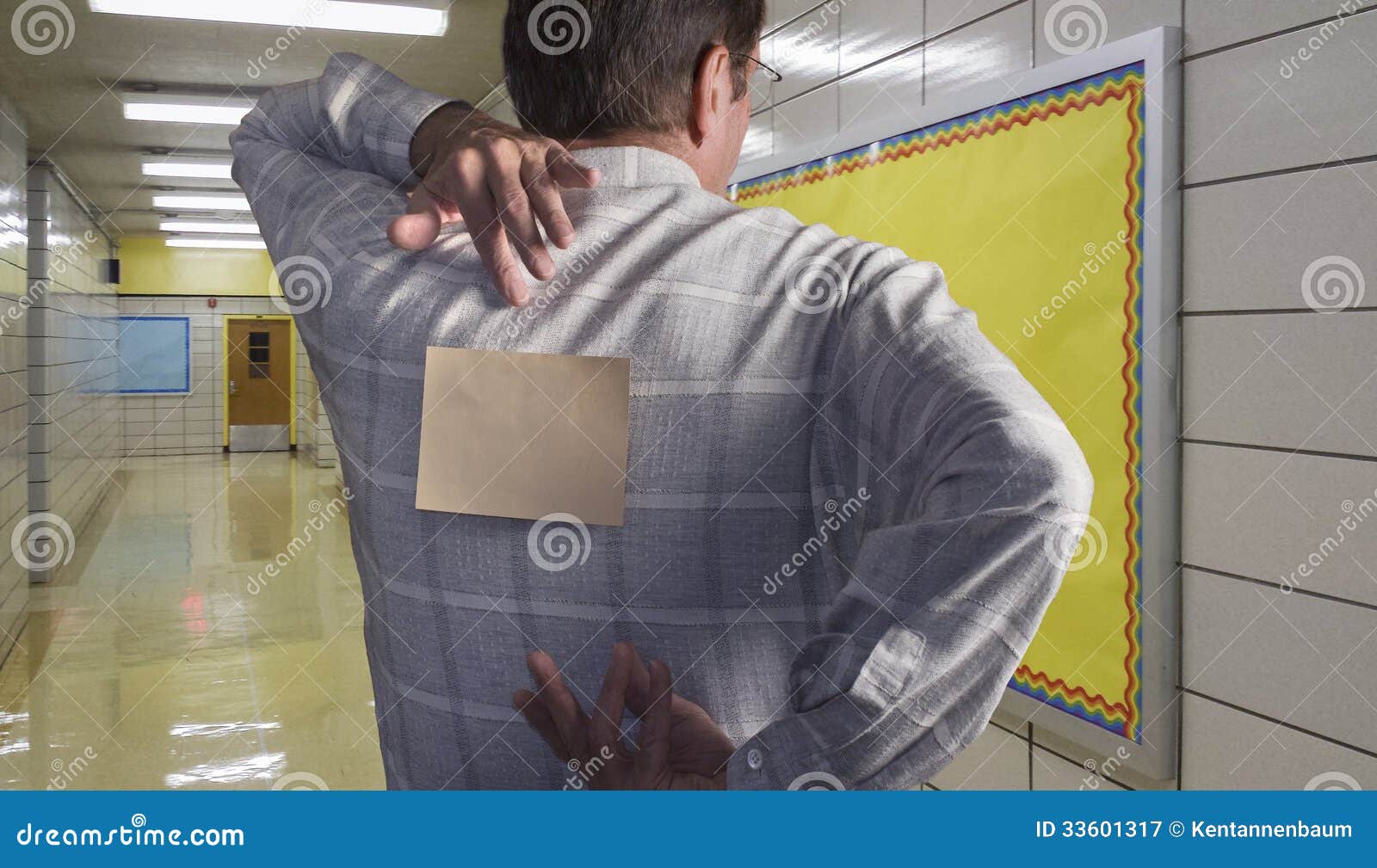 Man with Note on Back in School Hallway Stock Image - Image of back ...