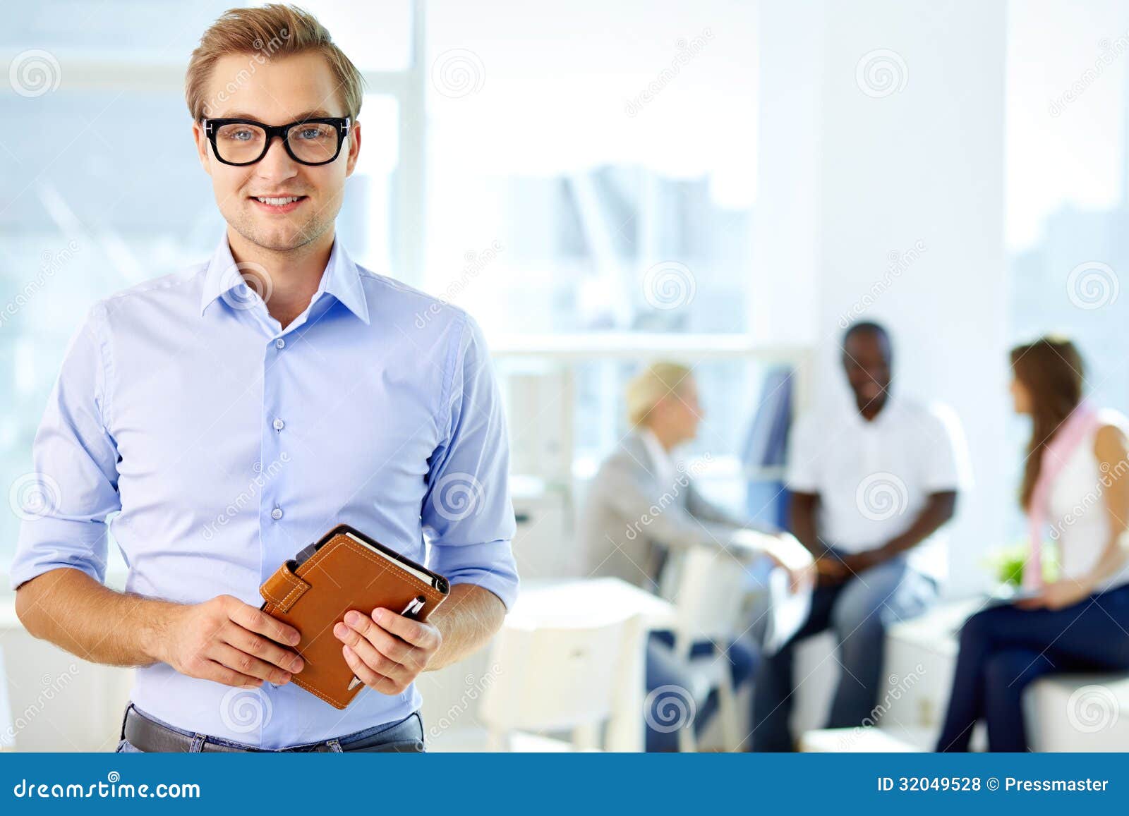 Man with notepad stock photo. Image of looking, group - 32049528