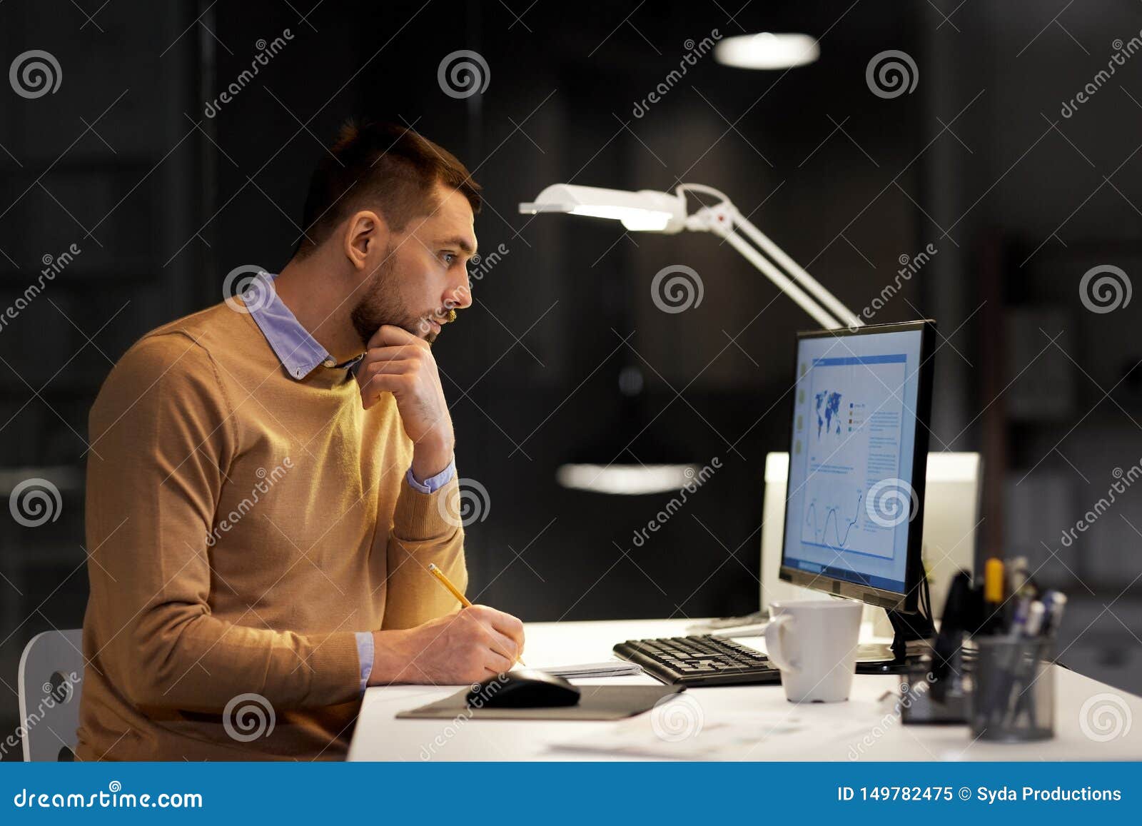 Man with Notepad Working at Night Office Stock Image - Image of ...