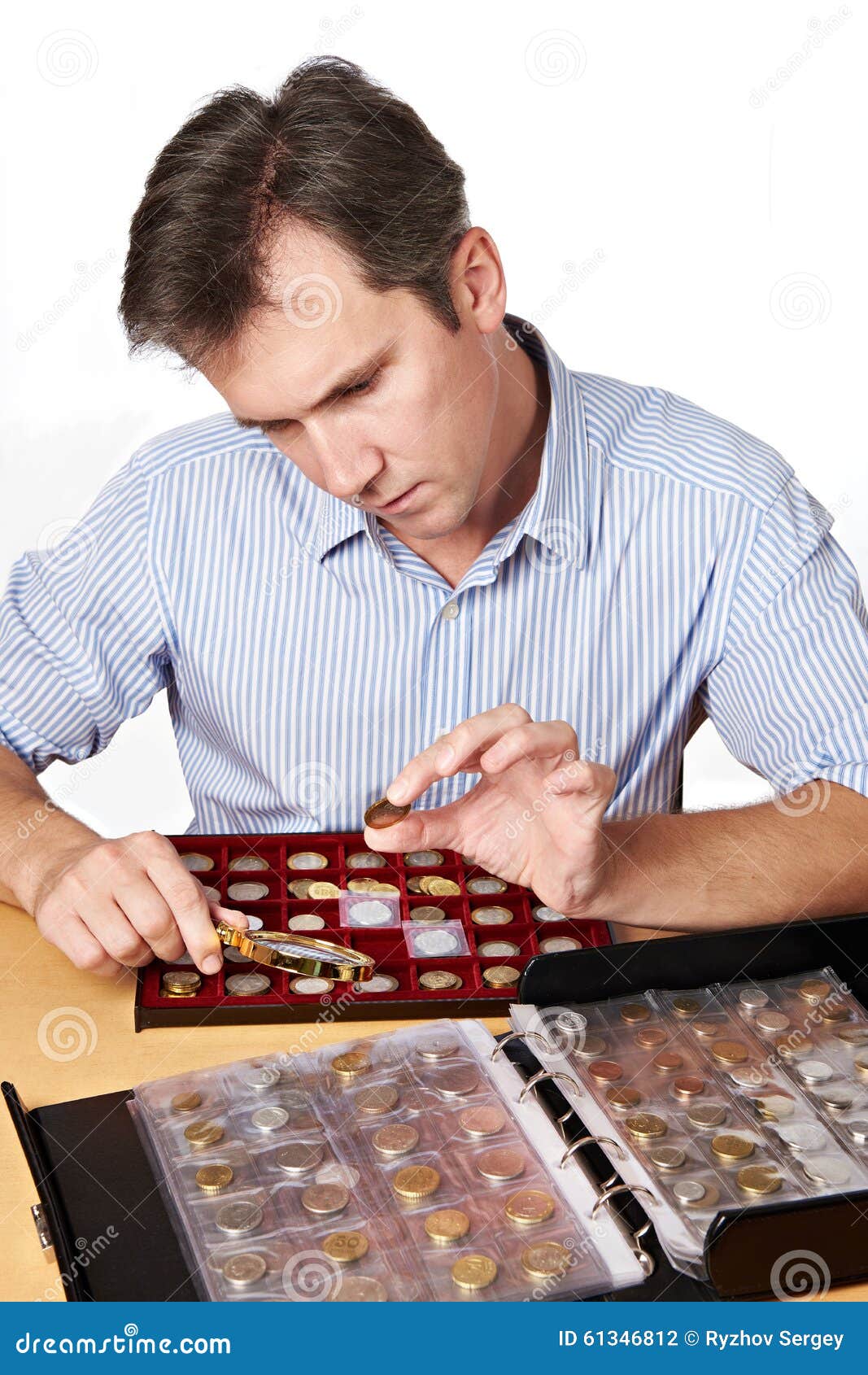 Man Numismatist Examines Coin from the Collection Stock Photo - Image ...
