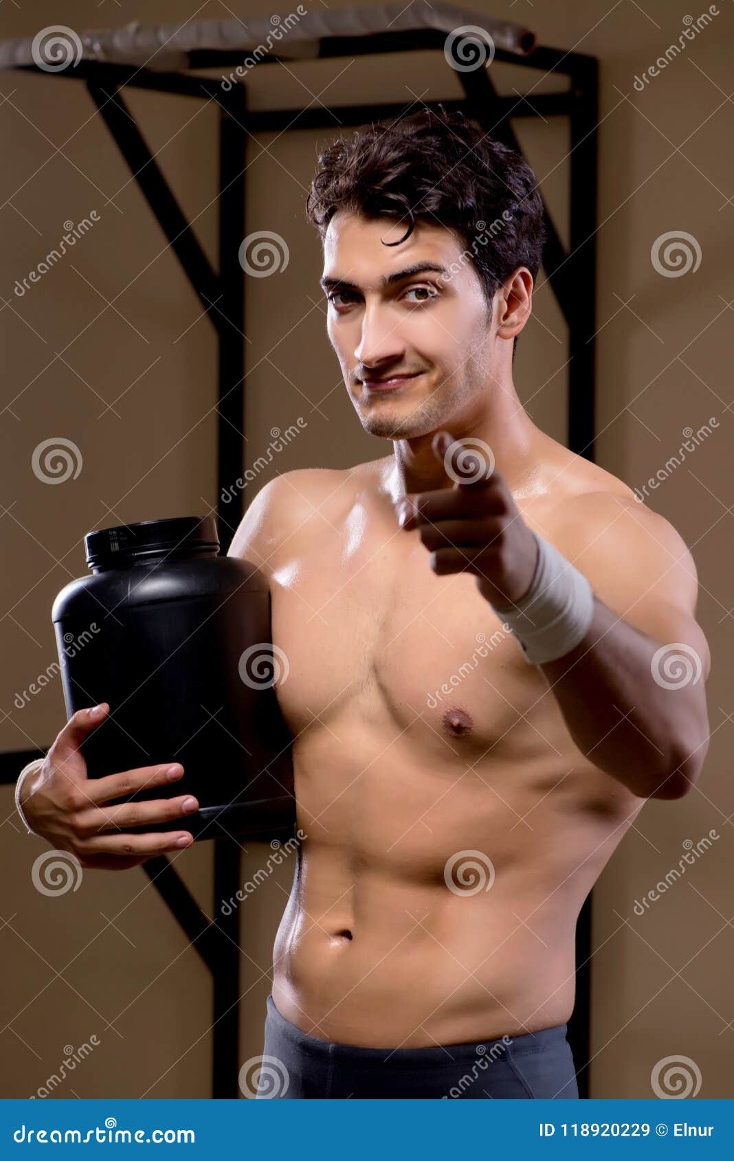 The Man with Nutrient Supplements in Sports Gym Stock Image - Image of ...