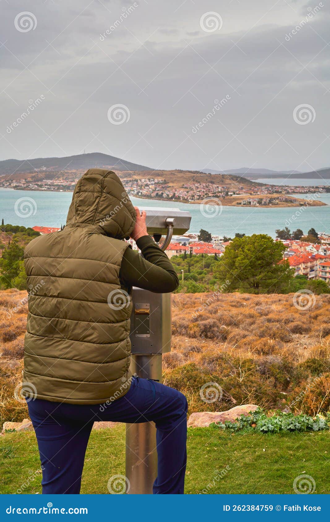 A Man on an Observation Deck Looks through a Telescope Stock Image ...