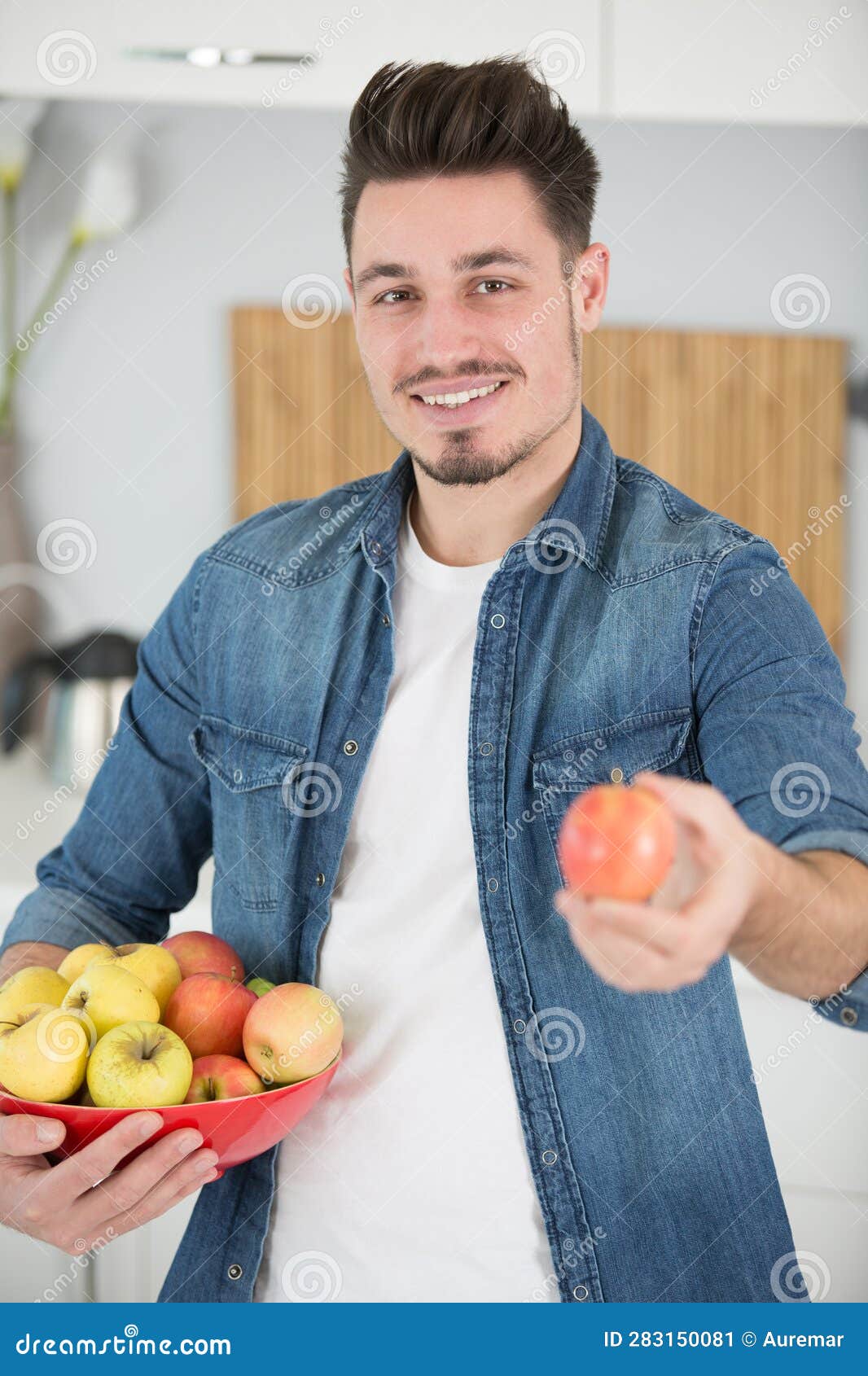 Man offering an apple stock image. Image of nutrition - 283150081