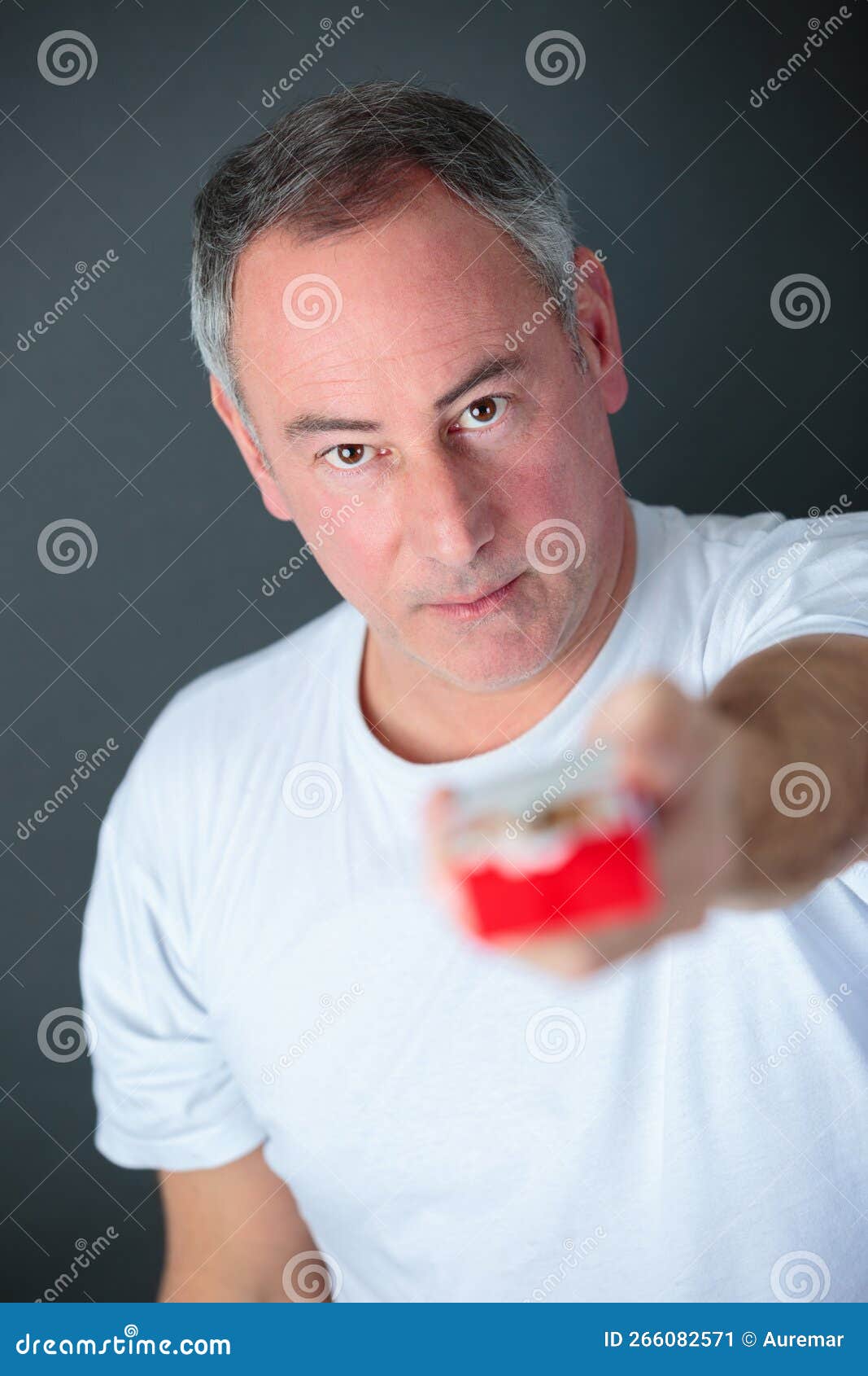 Man offering cigarettes stock image. Image of detail - 266082571