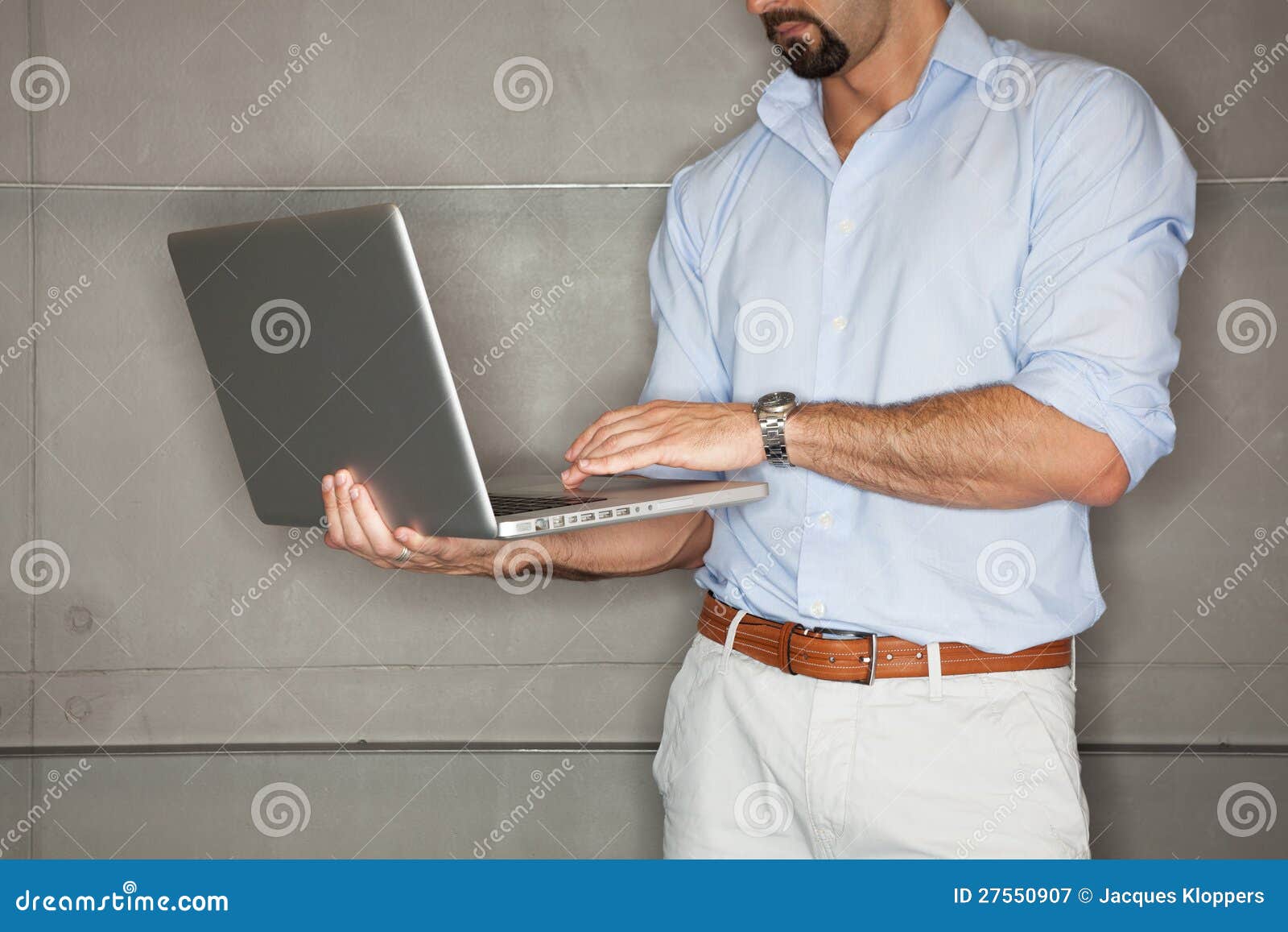 Man in Office Checking His Presentation on Laptop. Stock Image - Image ...