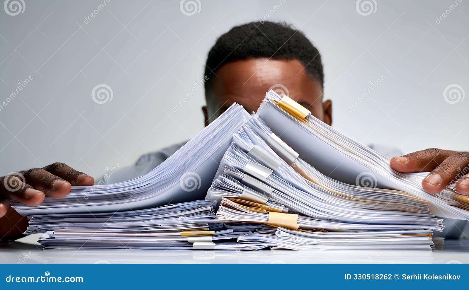 Office Worker with a Pile of Papers on His Desk. Man in the Office with ...