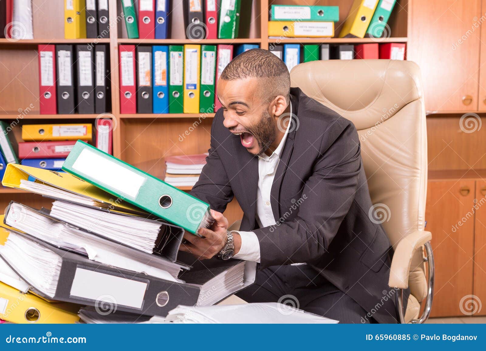 Man in Office with a Lot of Bored Paperwork Stock Image - Image of ...