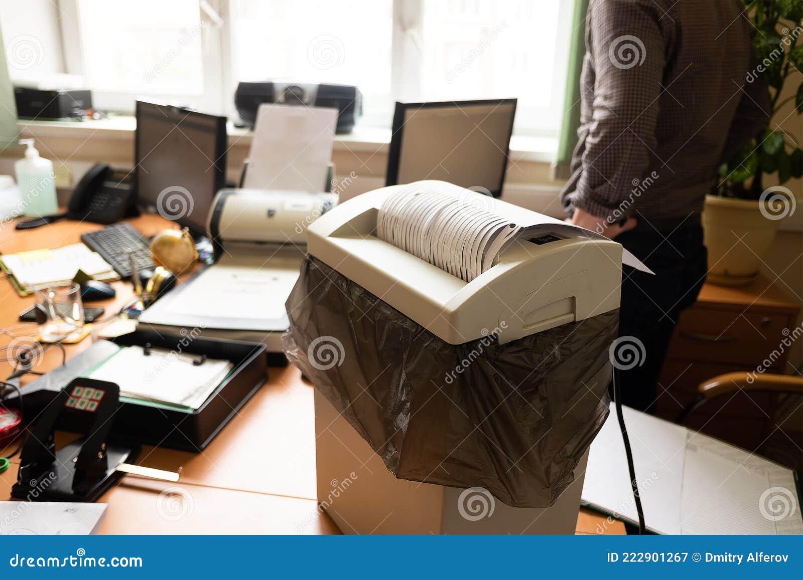 Man in Office Shreds Paper Documents in a Shredder Stock Image - Image ...