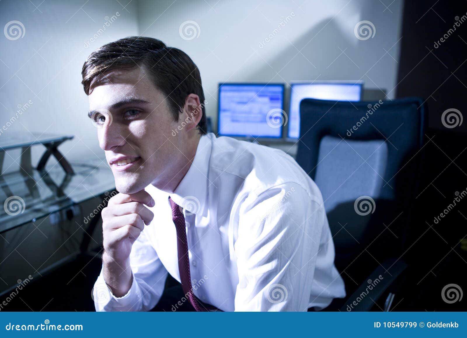 Man in office thinking stock image. Image of sitting - 10549799